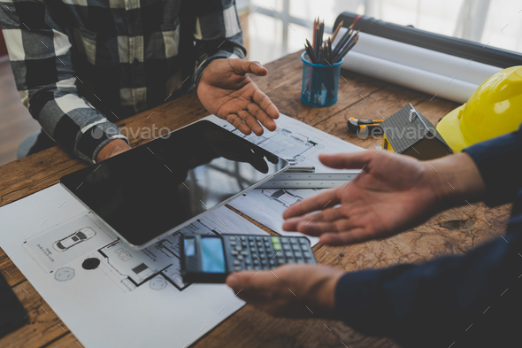 Structural engineer team discussing and calculating work Office design ...