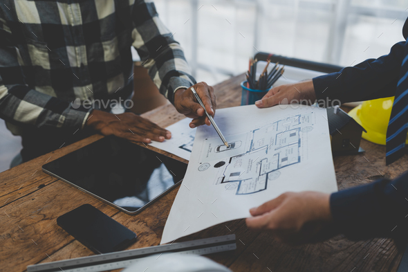 Structural engineer team discussing and calculating work Office design ...