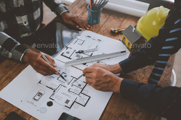 Structural engineer team discussing and calculating work Office design ...