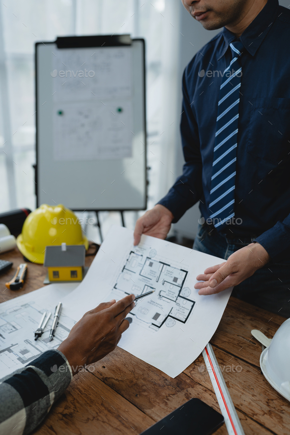 Structural engineer team discussing and calculating work Office design ...