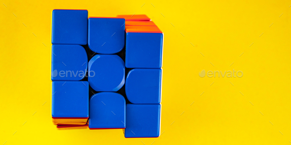 Rubik's cube on plain background. Speedcubing educational game concept ...