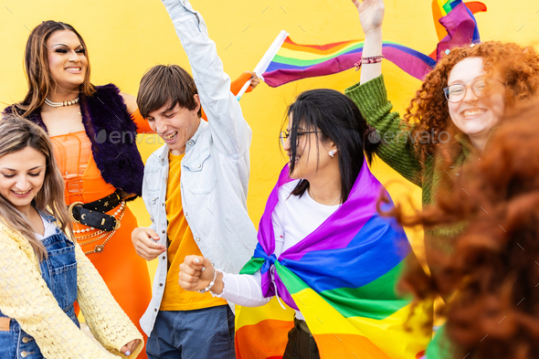 Diverse group of LGBTQ people celebrating gay pride festival otudoors ...