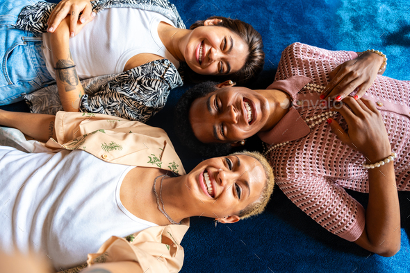 Group of friends bonding at home, LGBTQ and diversity concepts Stock ...