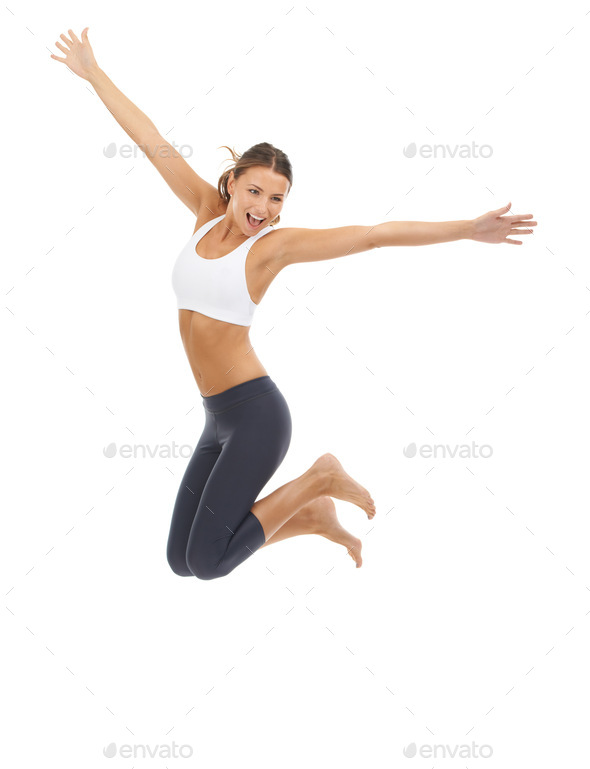 Jumping for the joy of exercise Stock Photo by YuriArcursPeopleimages