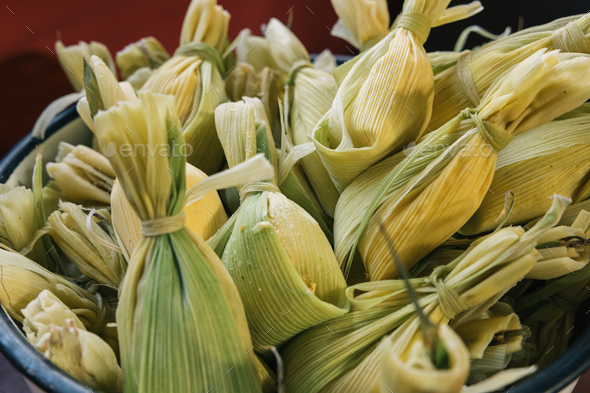 Traditional peruvian food, corn humitas platter Stock Photo by AmparoGV