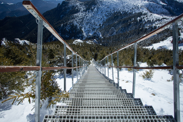 Ladder with stairs in the winter landscape. Ceahlau, Toaca. Romania ...