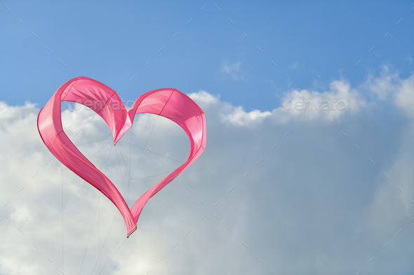Pink heart kite is flying in the wind Stock Photo by o1559kip | PhotoDune