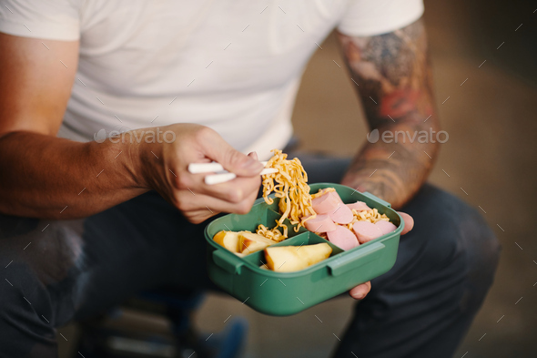 Mechanic Eating Lunch Stock Photo by DragonImages | PhotoDune