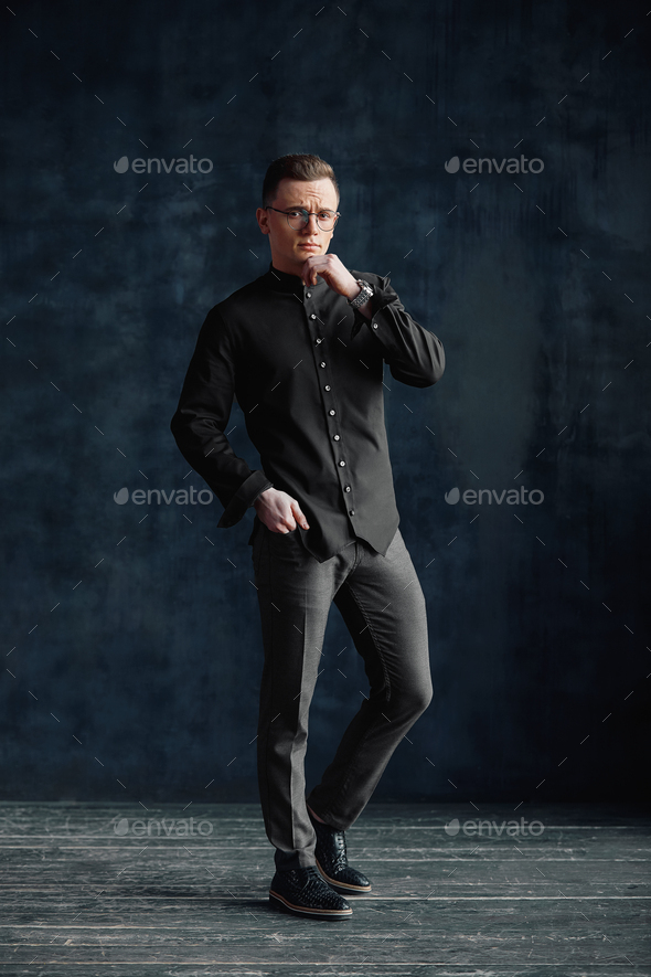 Elegant young handsome modern man. Fashion portrait studio, fashion ...