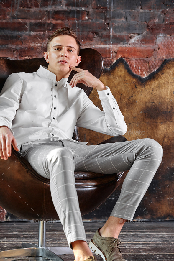 Elegant young handsome modern man. Fashion portrait studio, fashion ...