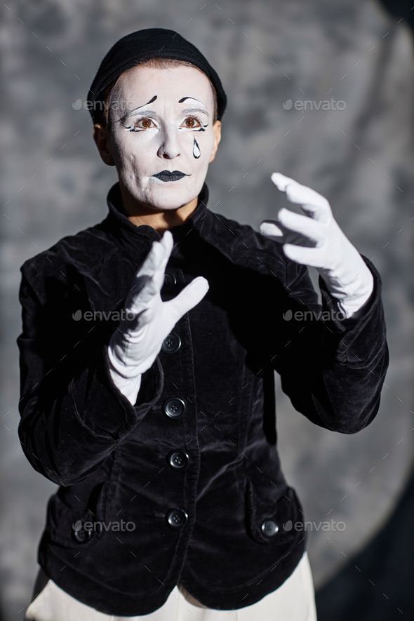 Mime Artist Performing on Stage with Sad Emotion Stock Photo by ...