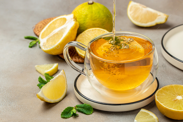 Bergamot tea in transparent cup with fresh bergamot fruit, Stock Photo ...