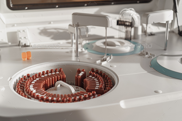 Microcentrifuge machine with test tubes standing in research laboratory ...