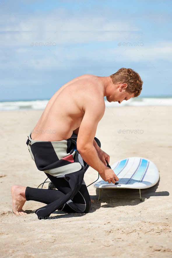 Getting ready to go surfing Stock Photo by YuriArcursPeopleimages ...