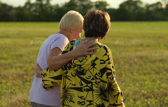 The close encounter of two friends, sharing a laugh; a simple yet ...