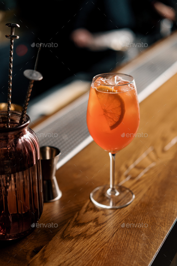 Delicious Aperol spritz cocktail standing on bar counter in restaurant ...