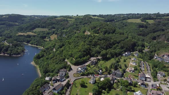 Woffelsbach at the Rursee in Germany, sailboats sailing at the lake ...
