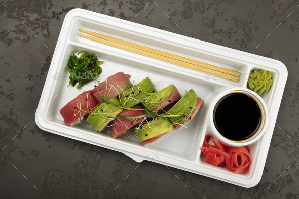 Take away set of tuna and avocado sushi rolls Stock Photo by ...