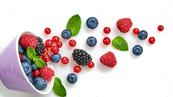 Different berry flying in air isolated on white background, cutout ...