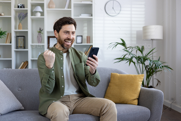 Man received online win notification and successful online achievement ...