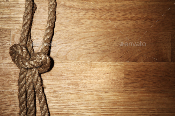 Old rope over wooden surface Stock Photo by Microstock_Growth | PhotoDune