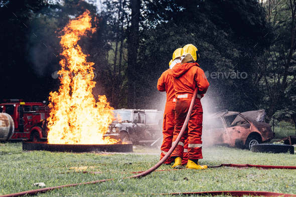 Firefighter Concept. Several firefighters go offensive for a fire ...