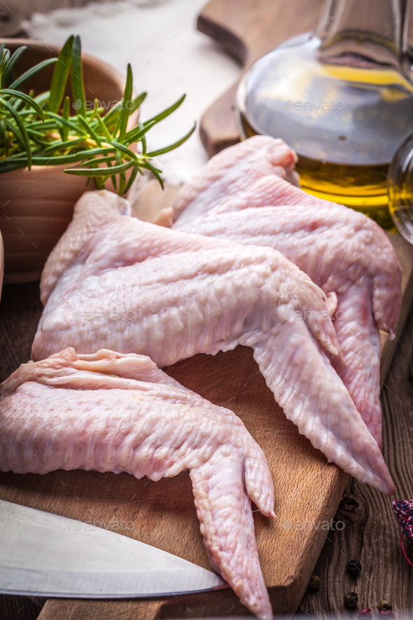 Fresh chicken wings. Stock Photo by foto_pstryki | PhotoDune
