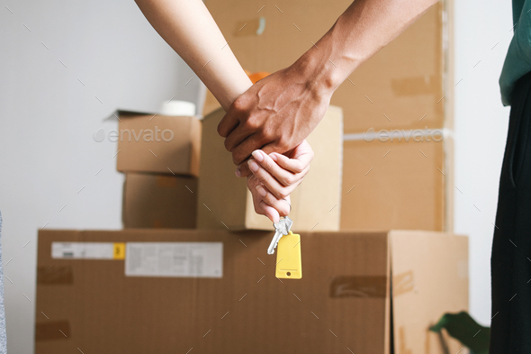 Close-up Couple's Hands Holding Key Move to New House Stock Photo by ...