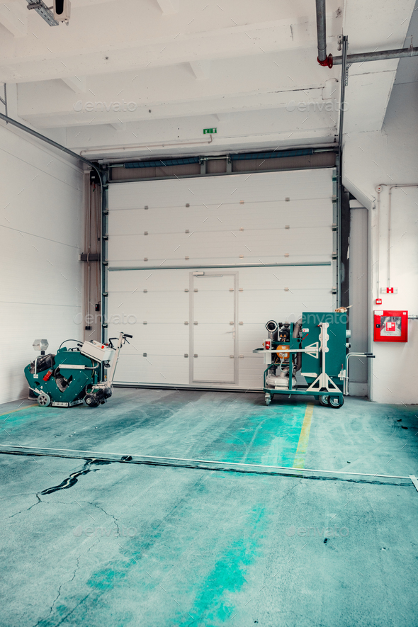 two concrete or floor grinding machine, polishing machine inside a ...