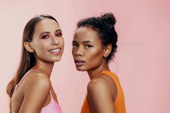 Woman mixed skin race beauty make-up together two model Stock Photo by ...