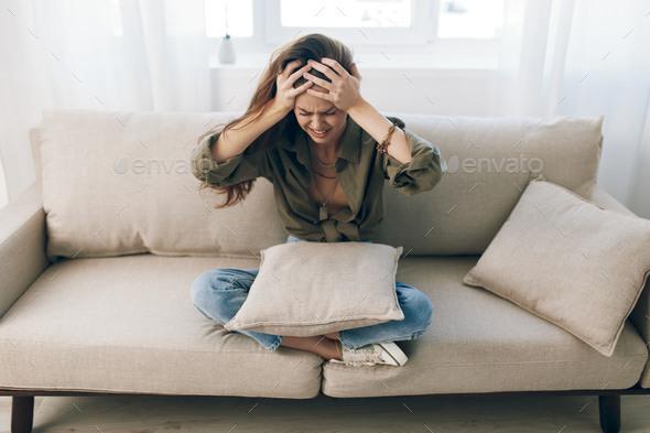 Lonely Woman on Couch, Feeling Sad and Worried in a Home Setting Stock ...