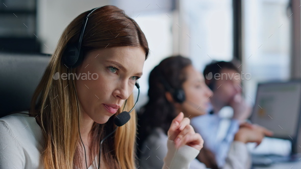 Annoyed telemarketing operator talking client closeup. Angry woman ...
