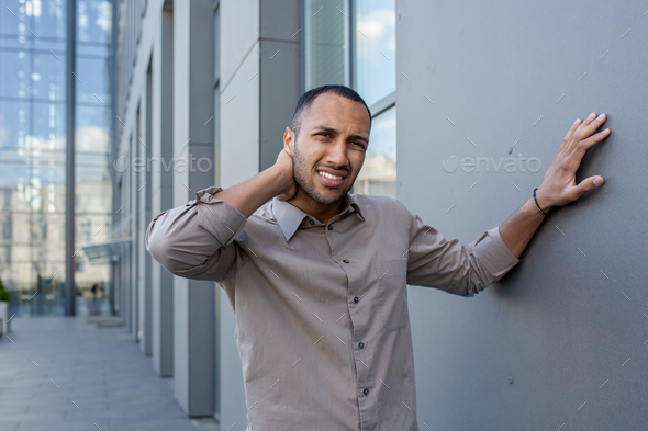 An overworked and overworked office worker, a man outside the office ...