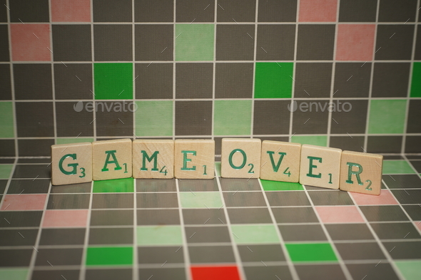 Tile with green game over text on a blocked background Stock Photo by ...
