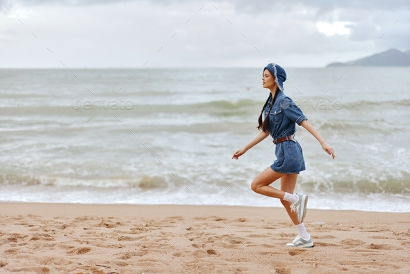 Healthy Beach Lifestyle: Young Woman Running on Sand by the Ocean ...