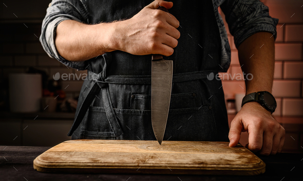 Chief man holding knife at kitchen Stock Photo by AFGreen | PhotoDune