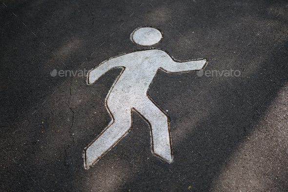 Pedestrian Lane Symbol on Asphalt. Stock Photo by eudial2224 | PhotoDune