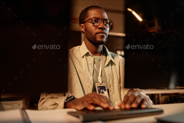 Black computer programmer Stock Photo by seventyfourimages | PhotoDune
