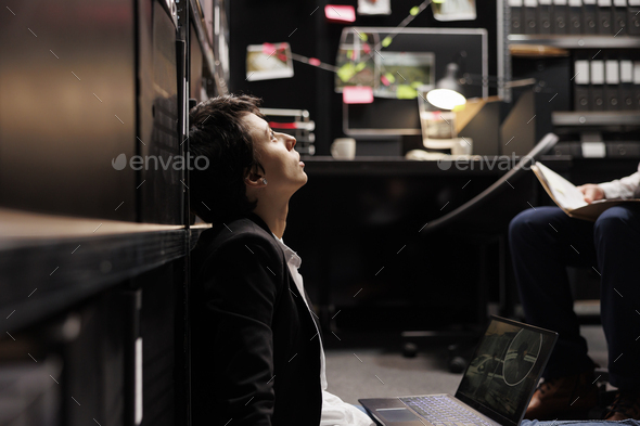 Tired police officers working overhours at criminal case Stock Photo by ...