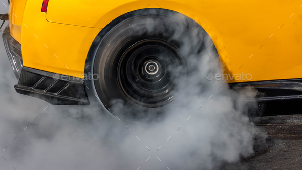 Car burnout wheels tire with white smoke,Car wheel burnout with smoke ...