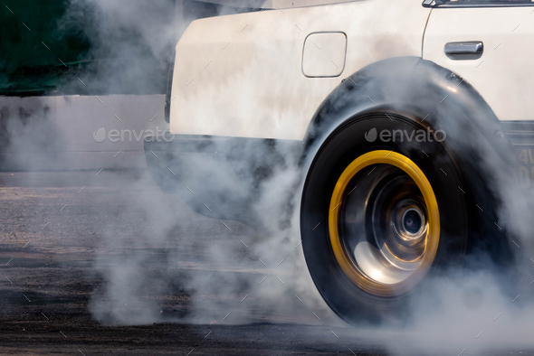 Car burnout wheels tire with white smoke,Car wheel burnout with smoke ...