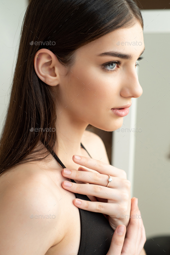 young woman model snapshot lingerie on white background. Classic poses ...