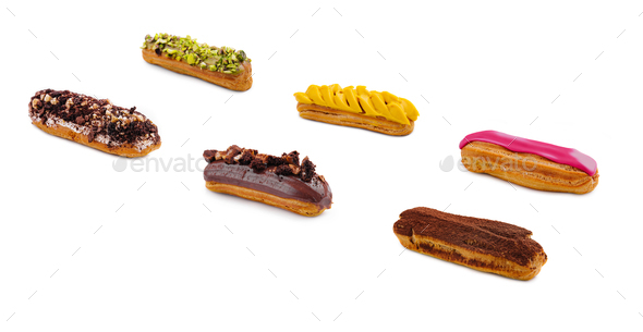 different types of French eclairs isolated Stock Photo by AntAlexStudio