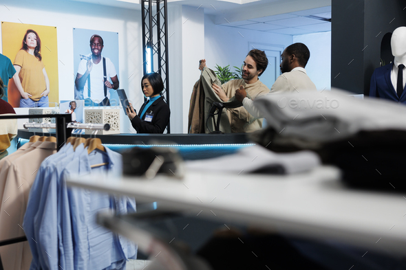 Customer and cashier talking at checkout Stock Photo by DC_Studio ...