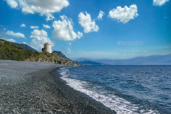 Corsica, the Nonza beach, with black pebble Stock Photo by wirestock