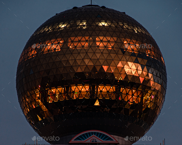 Revolving restaurant in the spherical building illuminated in the ...