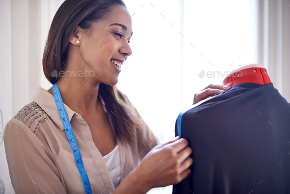 Making her design perfect Stock Photo by YuriArcursPeopleimages | PhotoDune