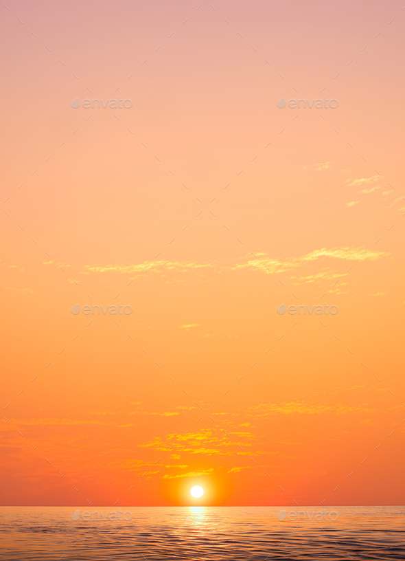 Golden sunrise sky background over sea with yellow sunlight reflection ...
