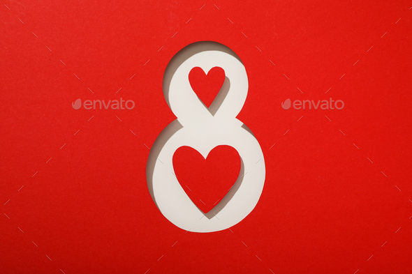 Number eight cut out of paper on a red background Stock Photo by ...