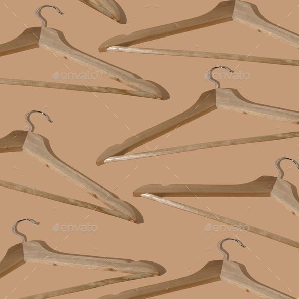 Pattern hangers for clothes. Hanger set. Beige background copy space ...